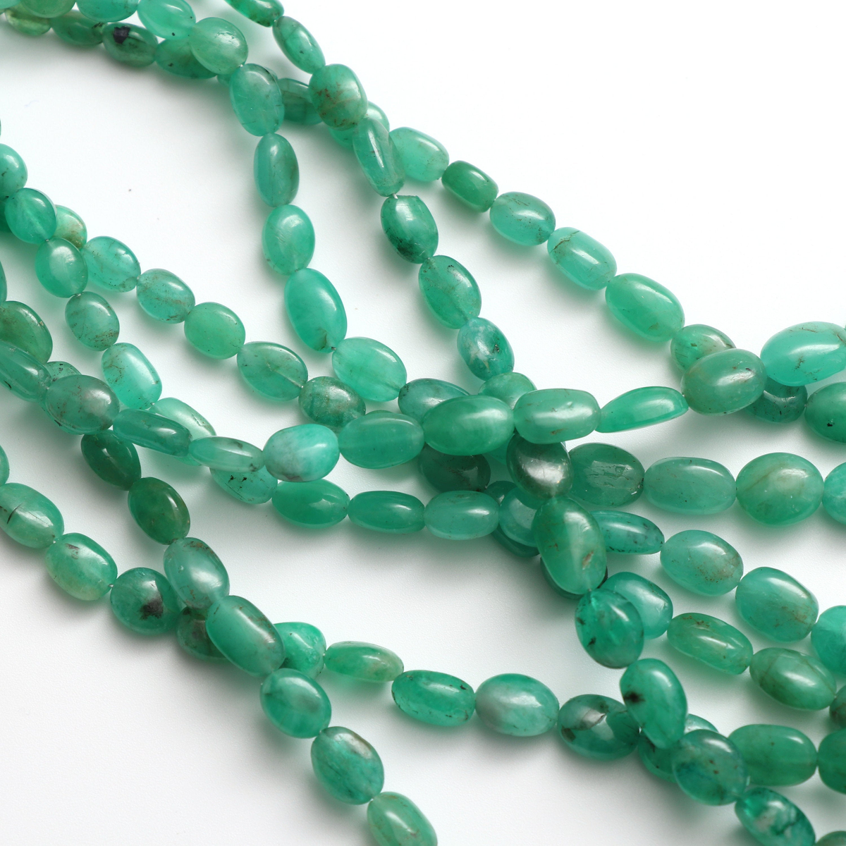 Wholesale natural organic Emerald Beads online | National Facets